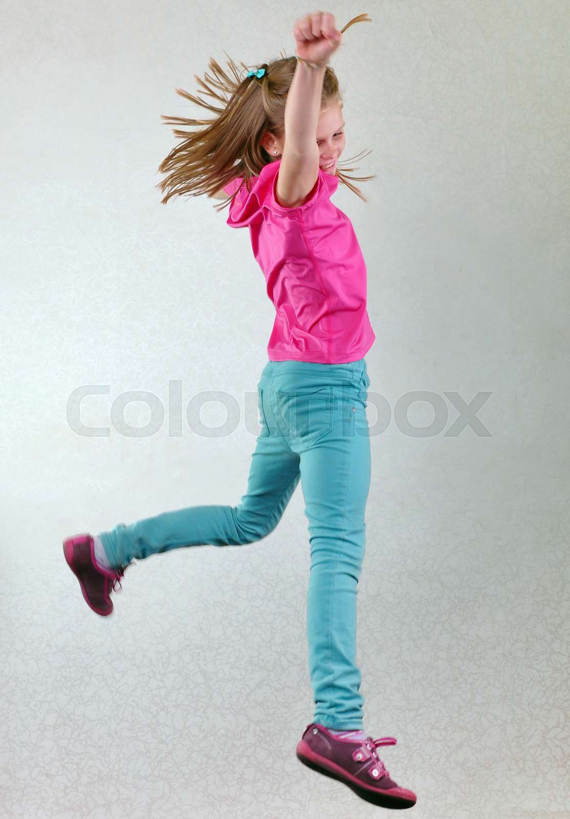 pretty girl jumping high | Stock image | Colourbox