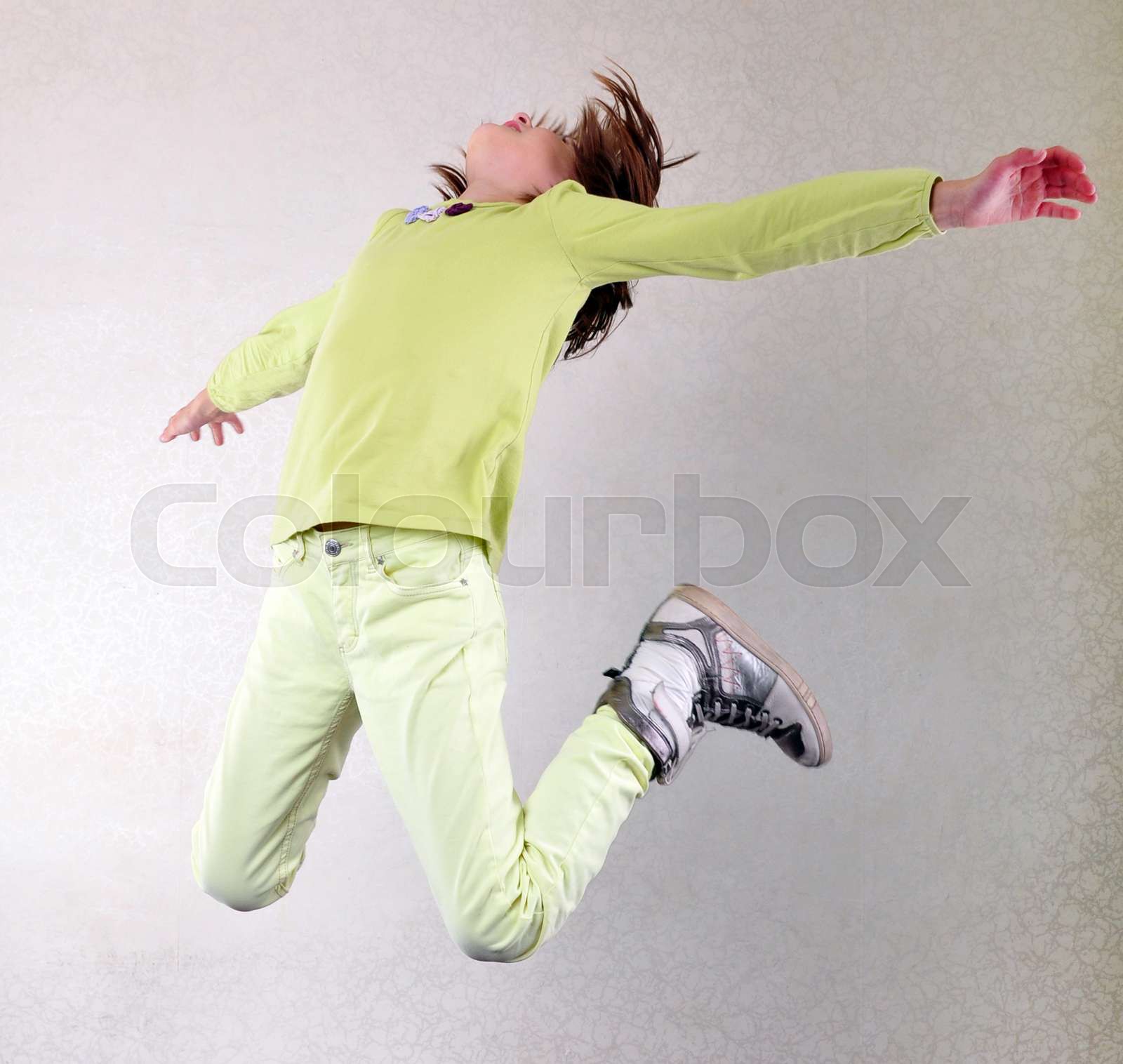 pretty girl jumping high | Stock image | Colourbox