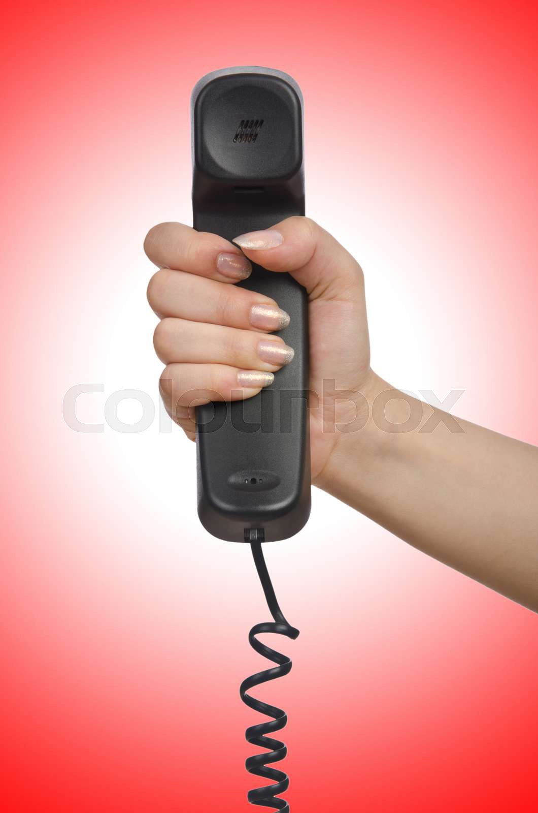 Hand with phone isolated on white | Stock image | Colourbox