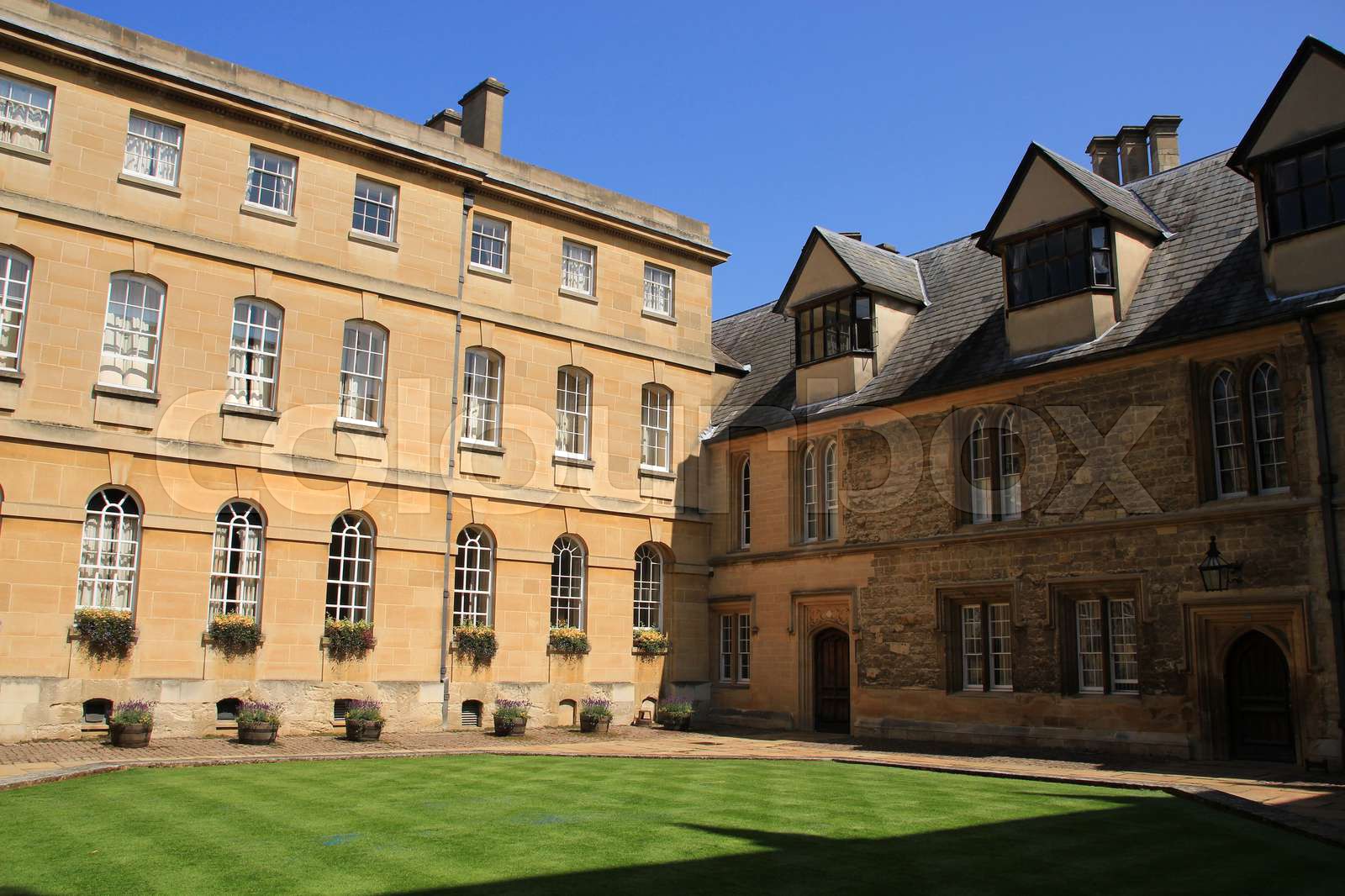Part of the courtyard and the University in the summer in Oxford in ...