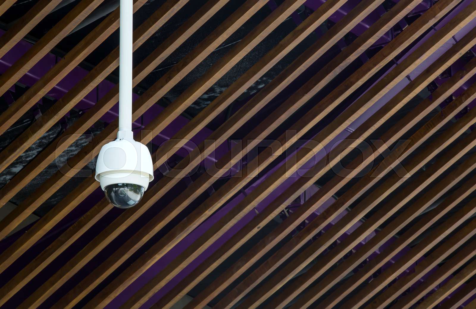 working surveillance cameras attached to the wall | Stock image | Colourbox