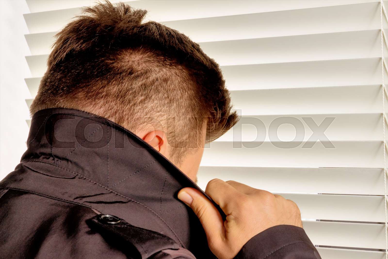 man with turned up collars | Stock image | Colourbox