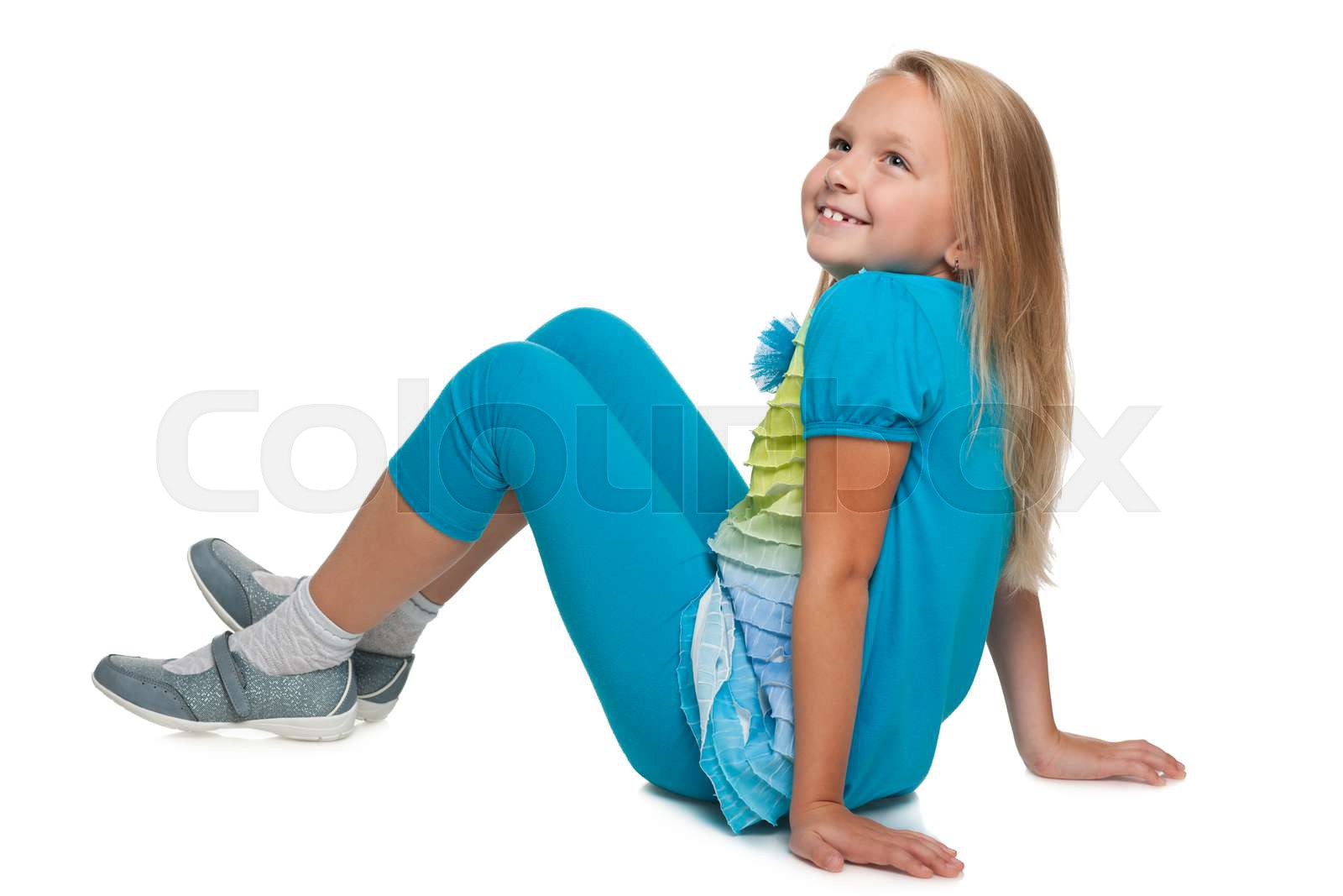 Happy little girl imagines | Stock image | Colourbox