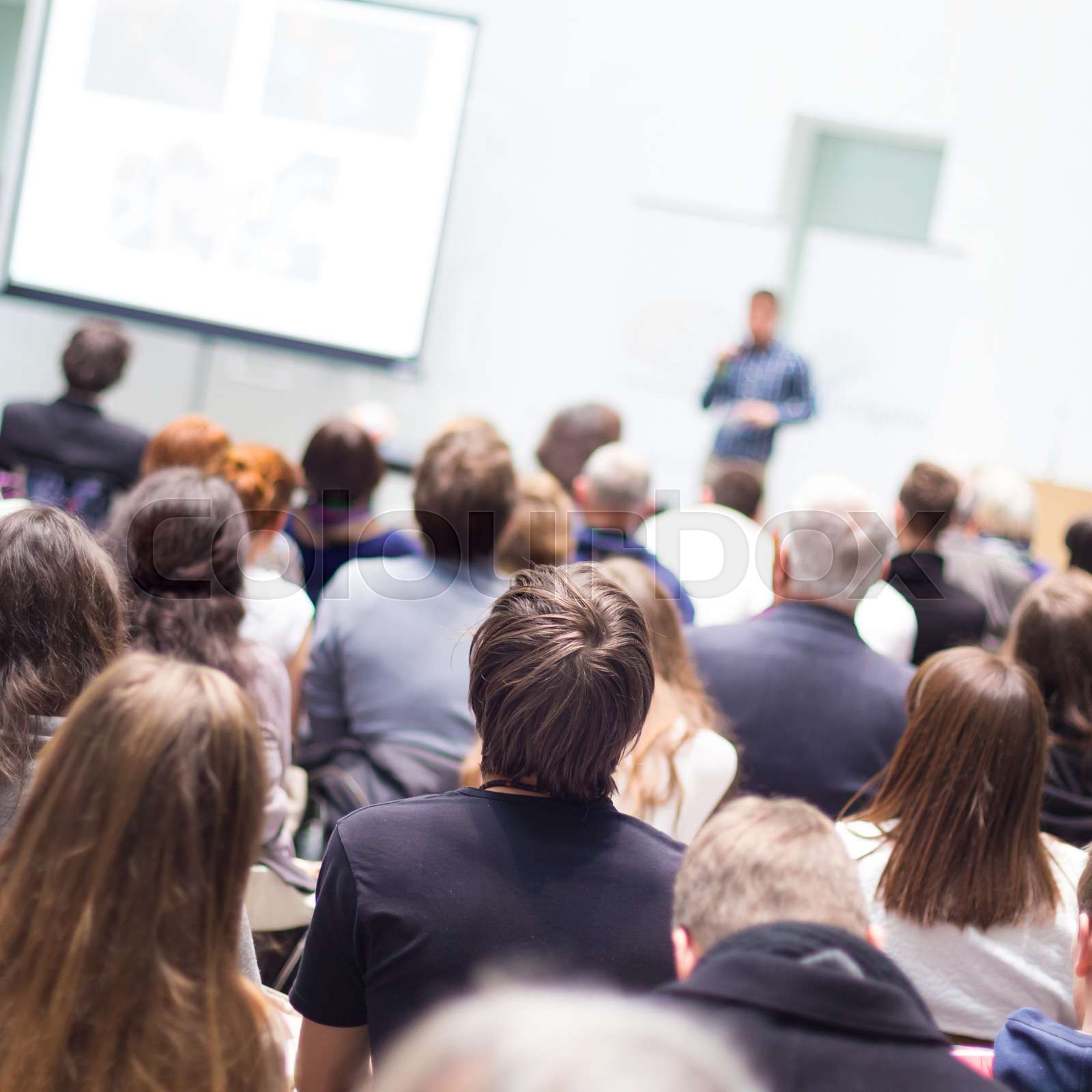 Audience in the lecture hall. | Stock image | Colourbox