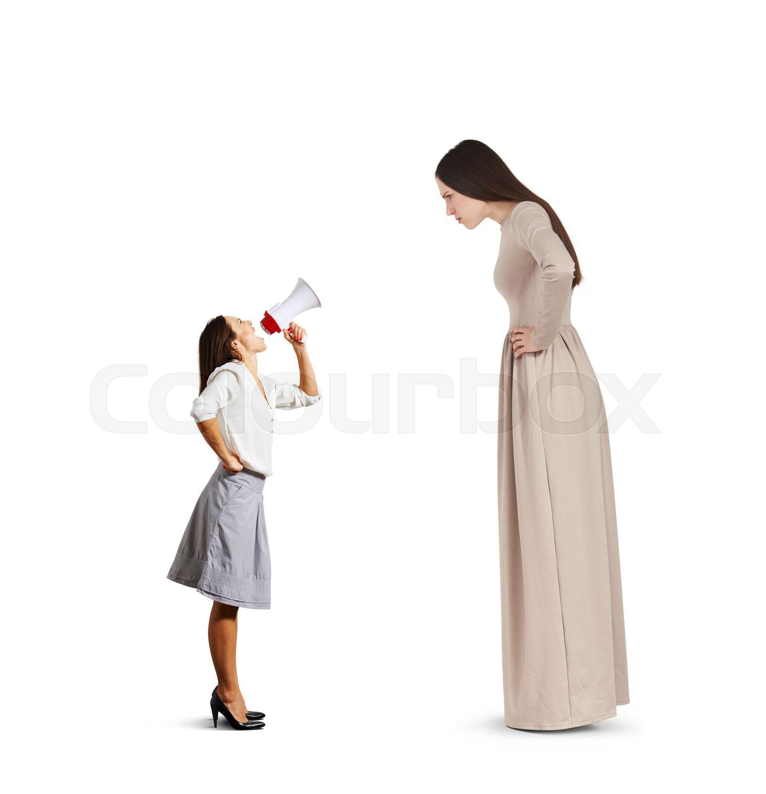 angry woman yelling at big serious woman | Stock image | Colourbox