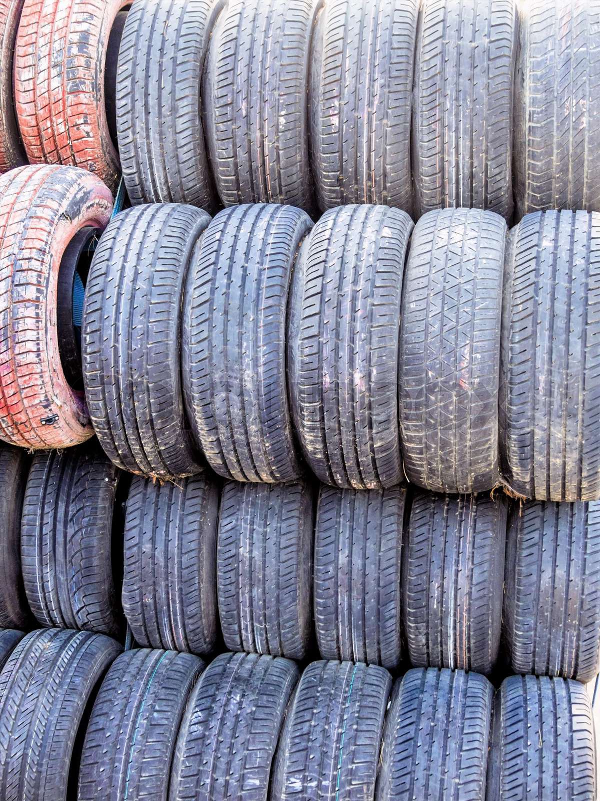 stack of worn car tires | Stock image | Colourbox