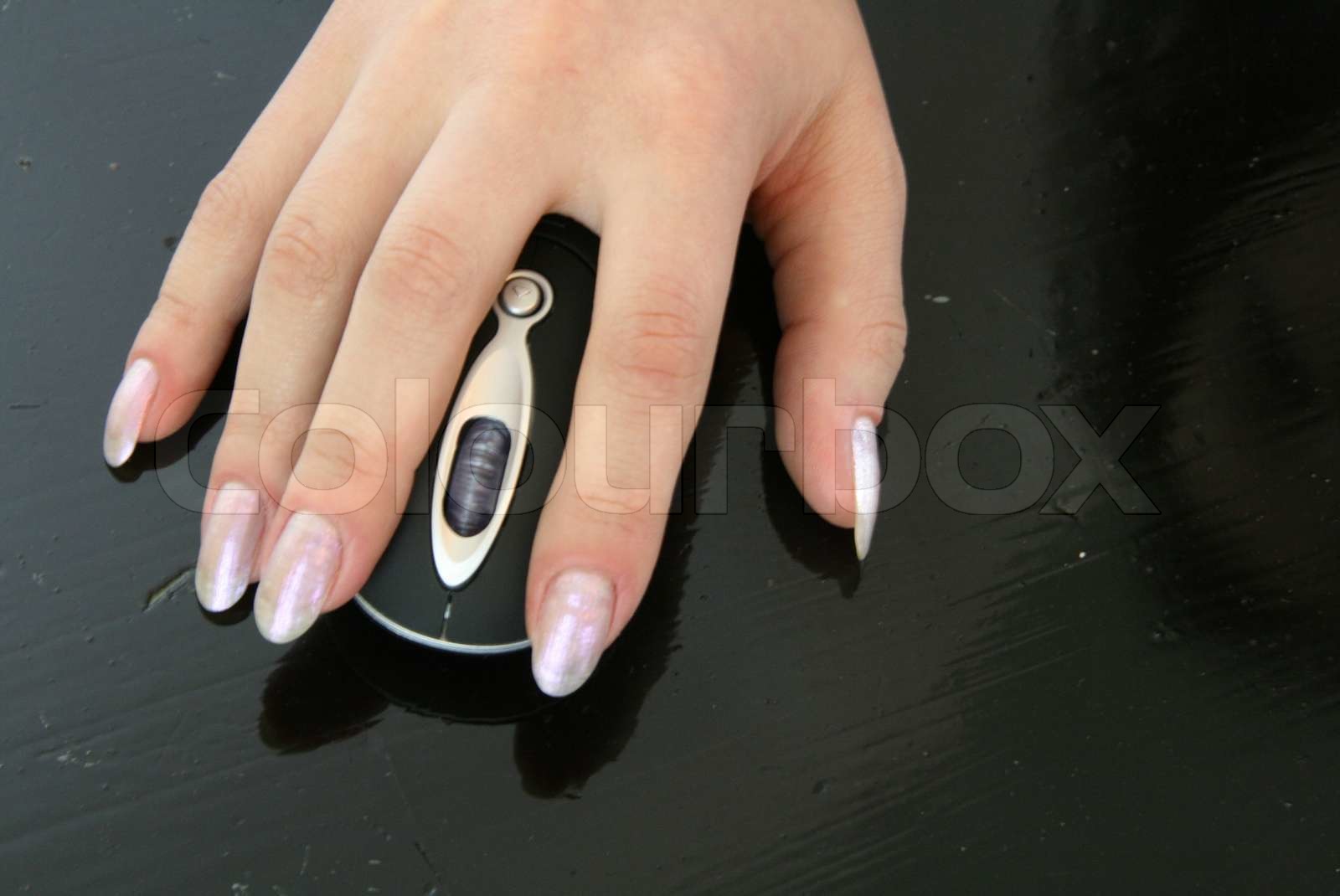 womens hand with mouse | Stock image | Colourbox