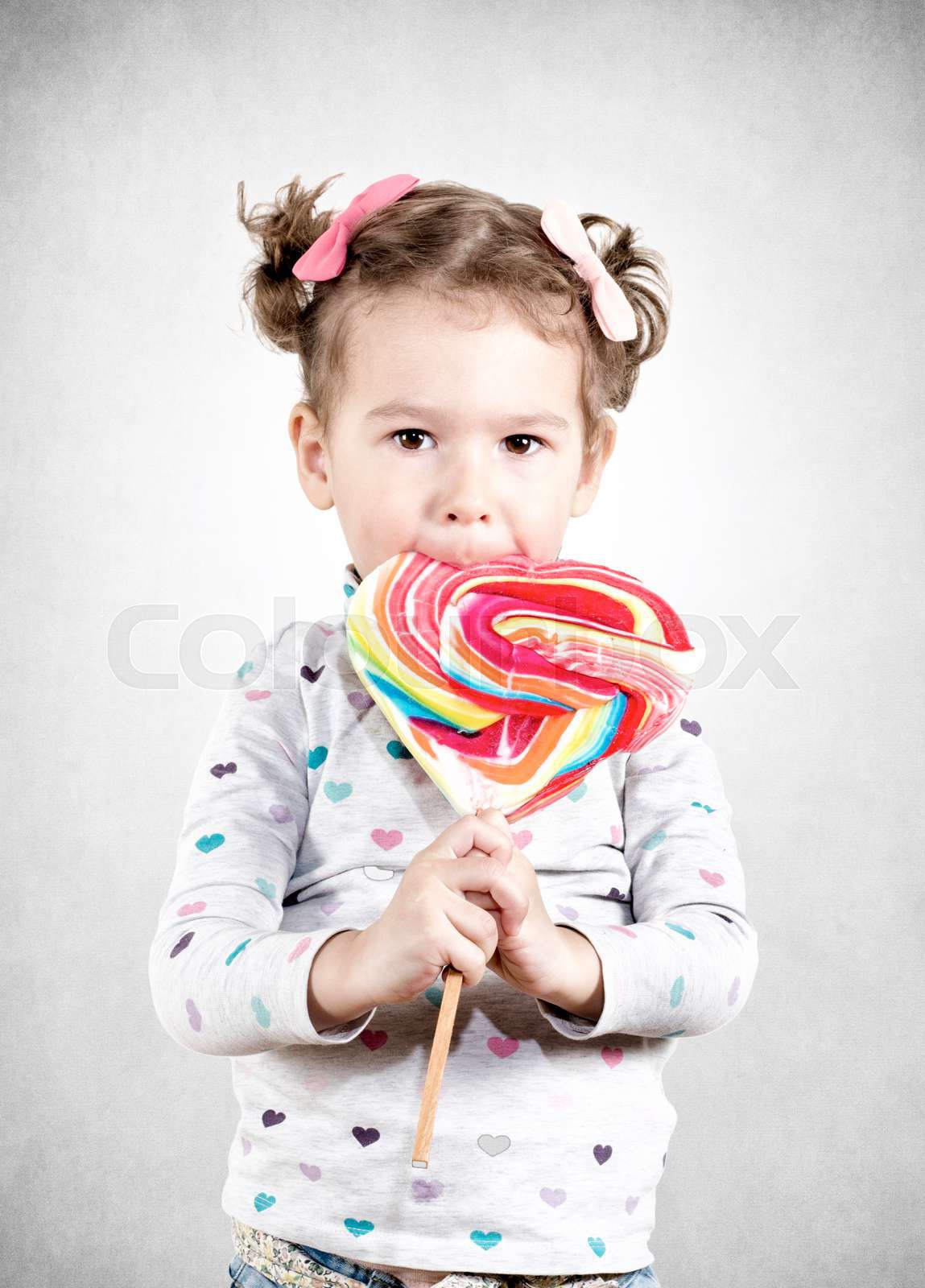 Child with candy | Stock image | Colourbox