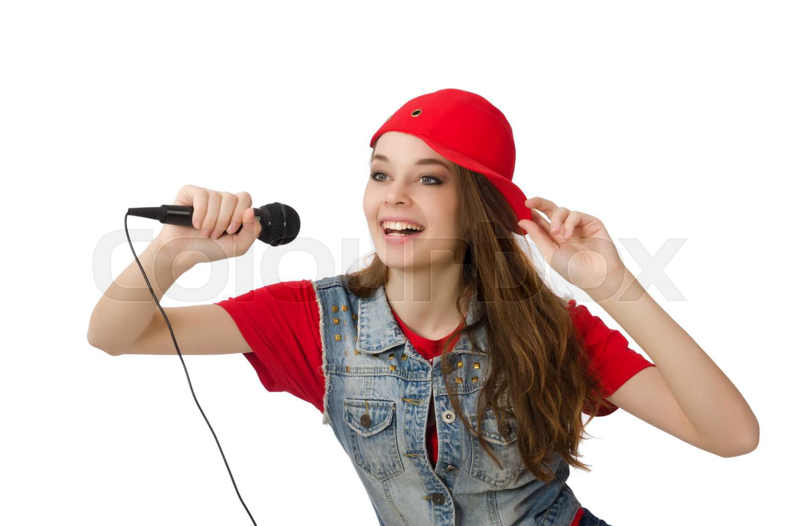 Pretty girl sings karaoke isolated on white | Stock image | Colourbox