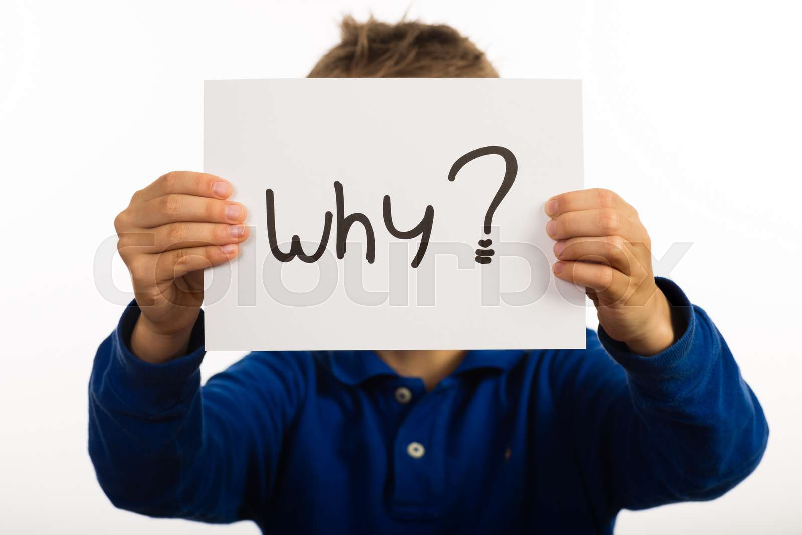 Child holding Why sign | Stock image | Colourbox