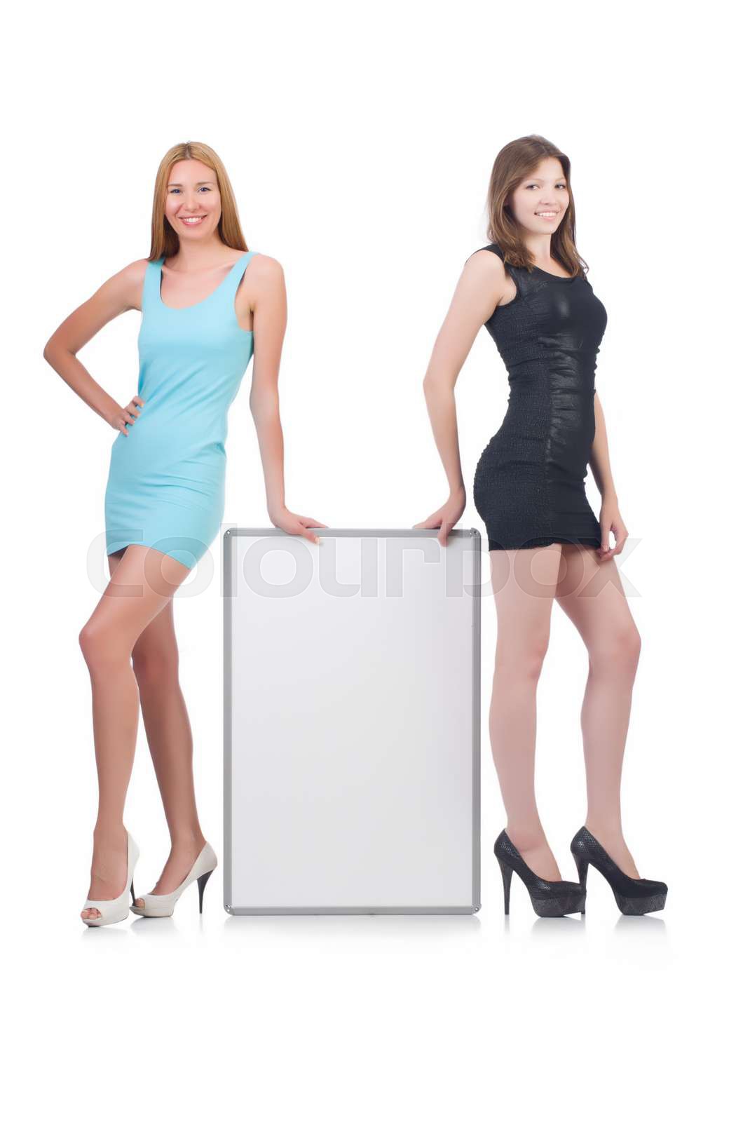 Female models in mini dresses isolated on white | Stock image | Colourbox