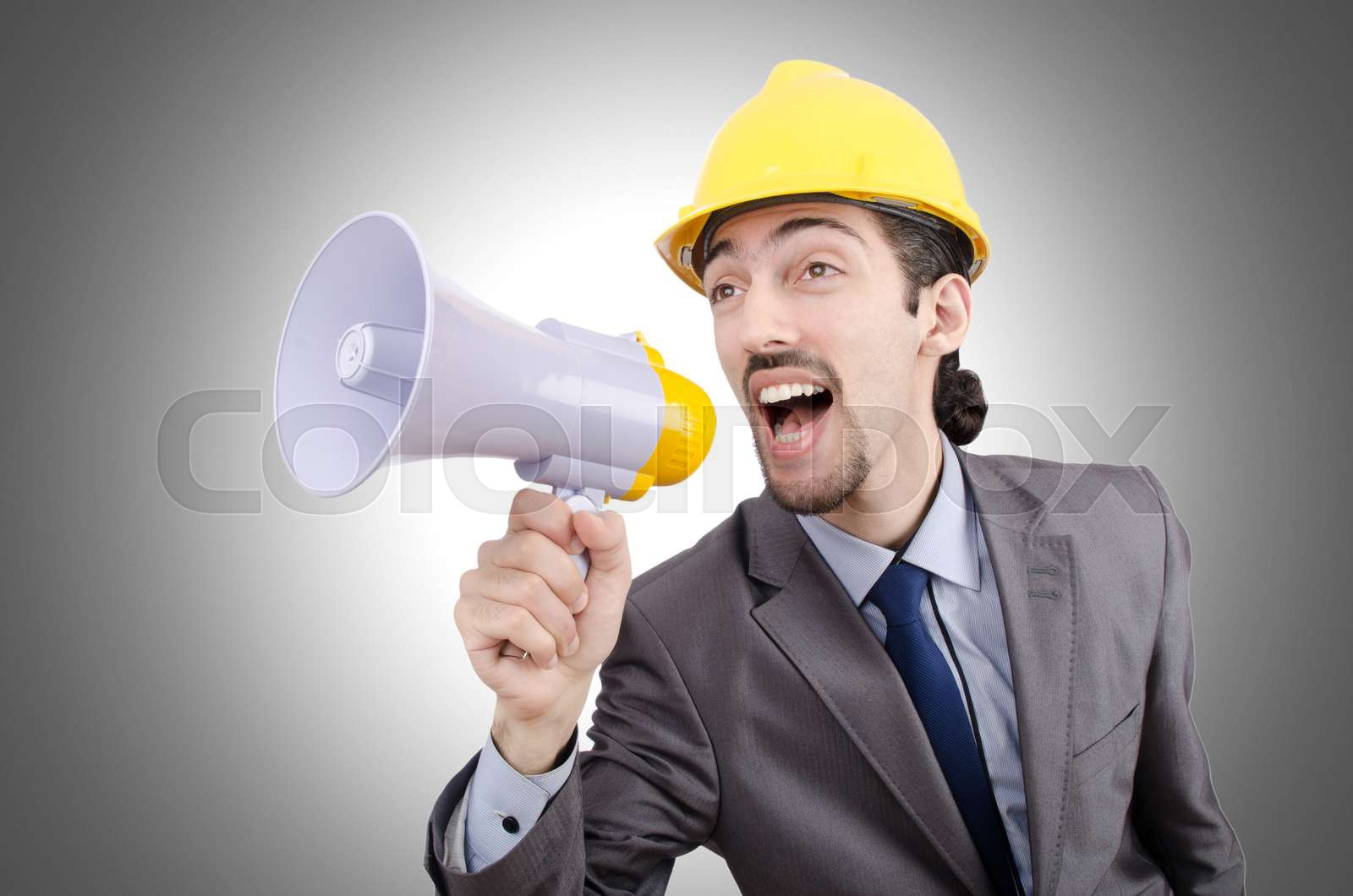 Man shouting and yelling with loudspeaker | Stock image | Colourbox