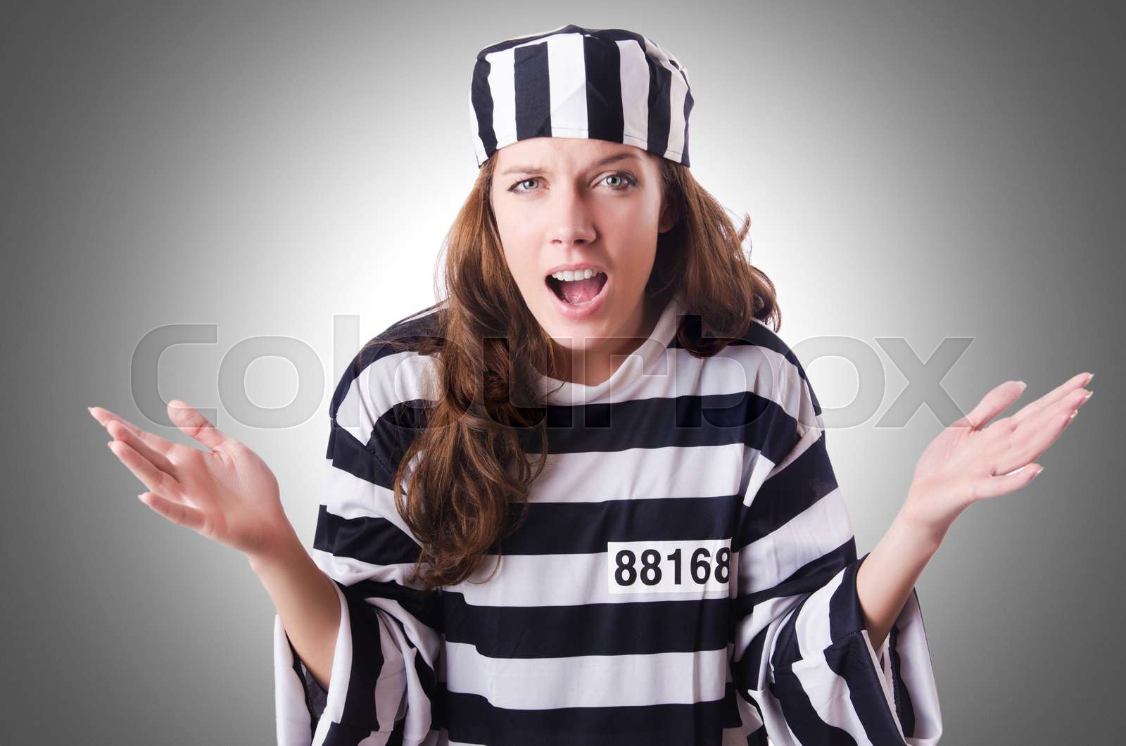 Convict criminal in striped uniform | Stock image | Colourbox