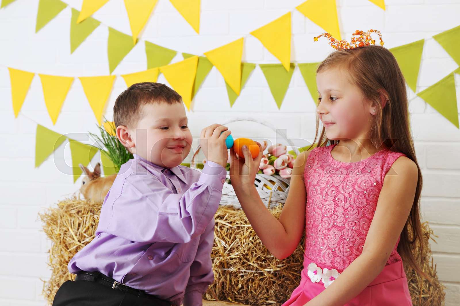 Children smash eggs | Stock image | Colourbox