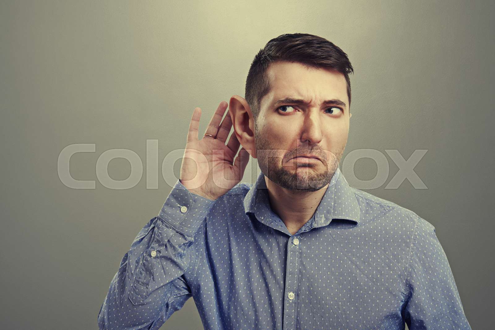 concerned young man with big ear | Stock image | Colourbox