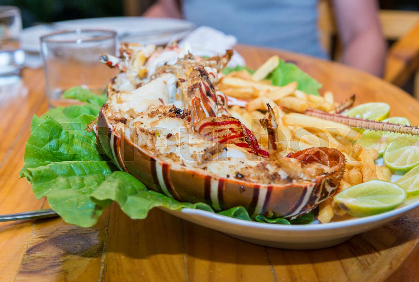 Lobster with french fries and salad | Stock image | Colourbox