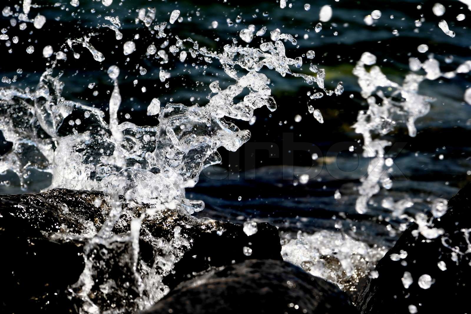 water spashing on rocks | Stock image | Colourbox