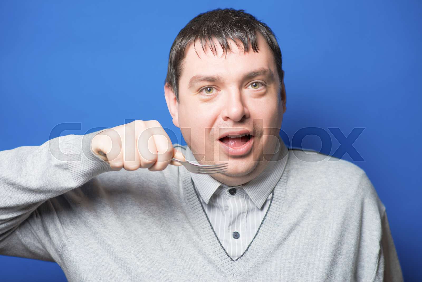 man with a fork | Stock image | Colourbox