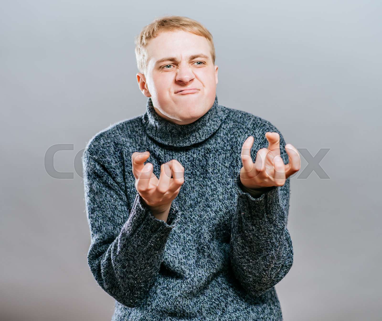 Angry aggressive man shouting out loud with ferocious expression ...