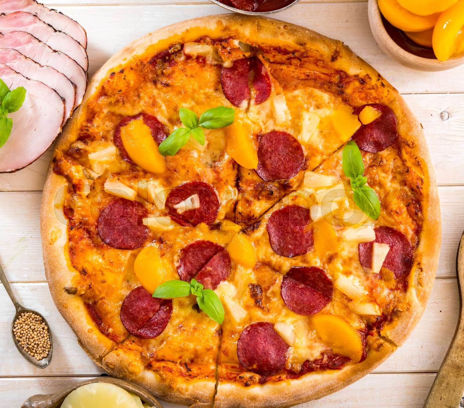 exotic pizza with pineapple and peach | Stock image | Colourbox