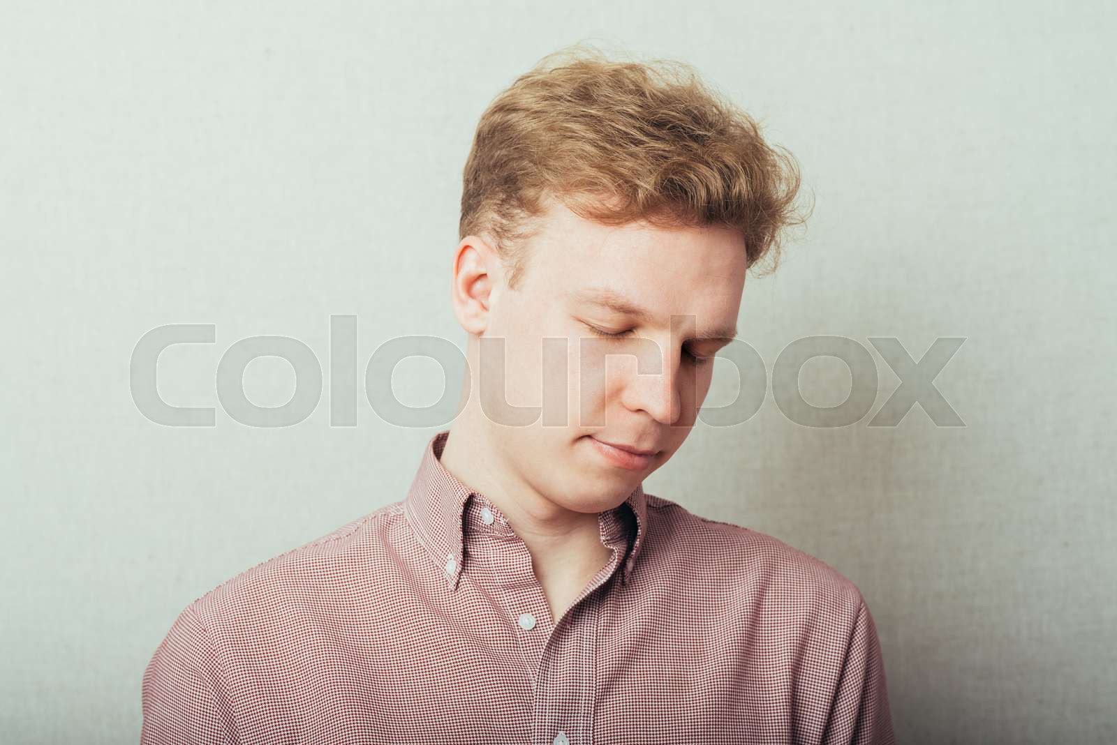sad man with his head down | Stock image | Colourbox