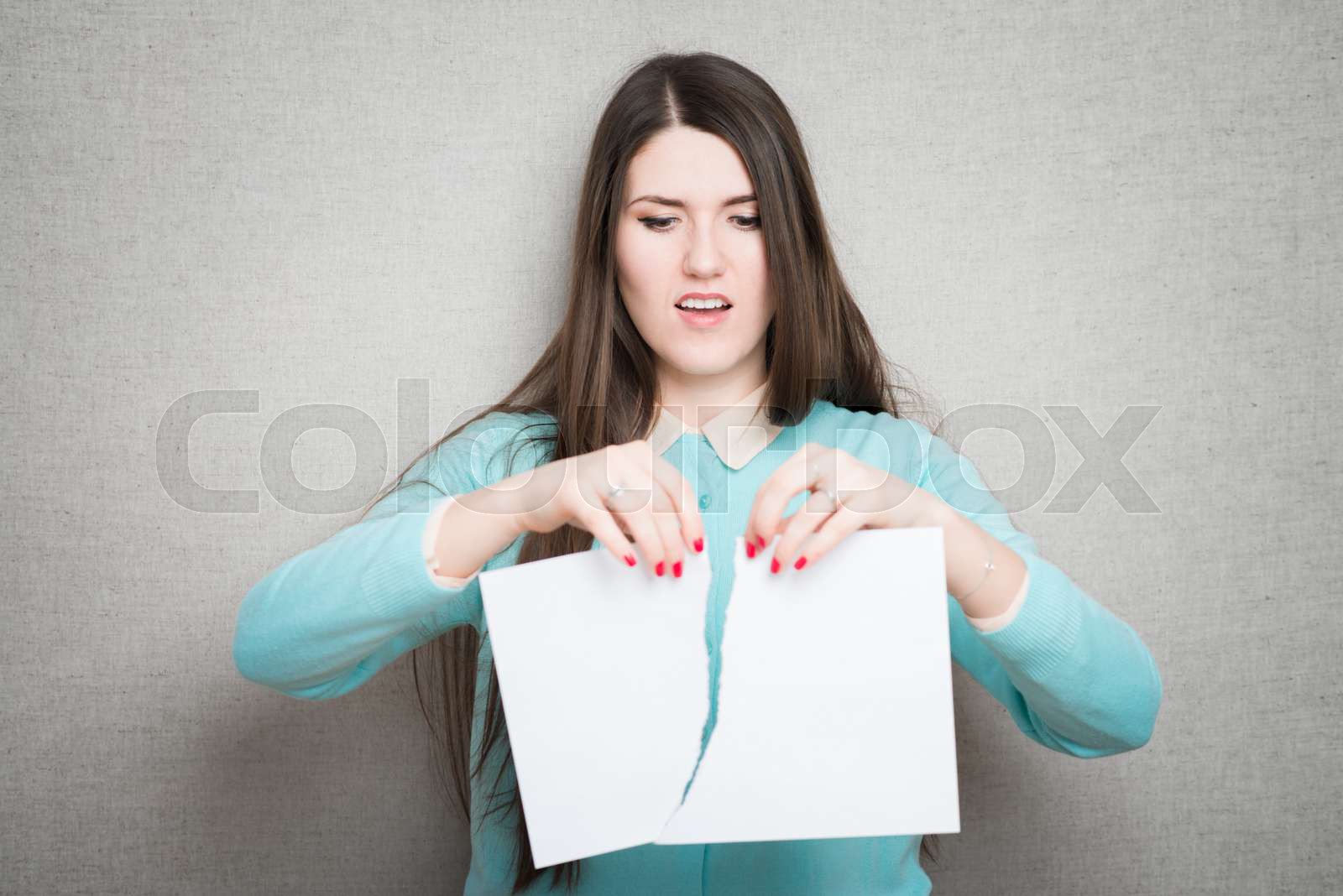 Confident business lady. Furious young woman tearing up paper | Stock ...
