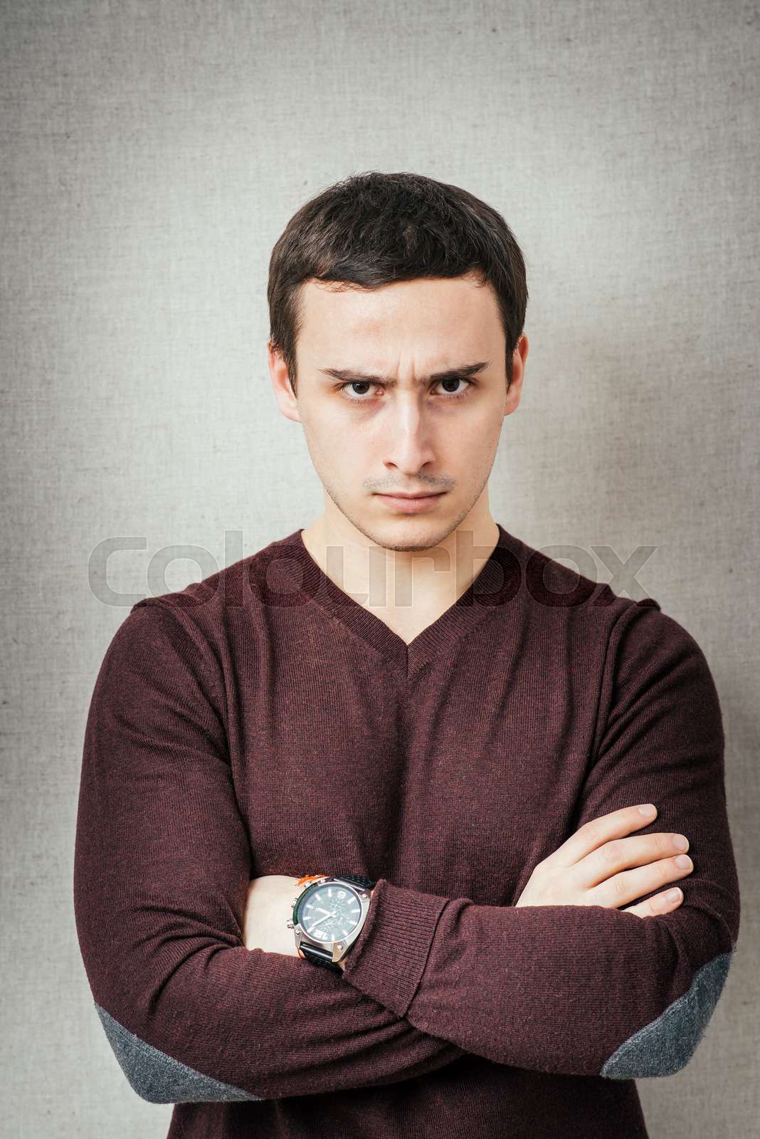 Portrait of disgusted man looking at the camera | Stock image | Colourbox
