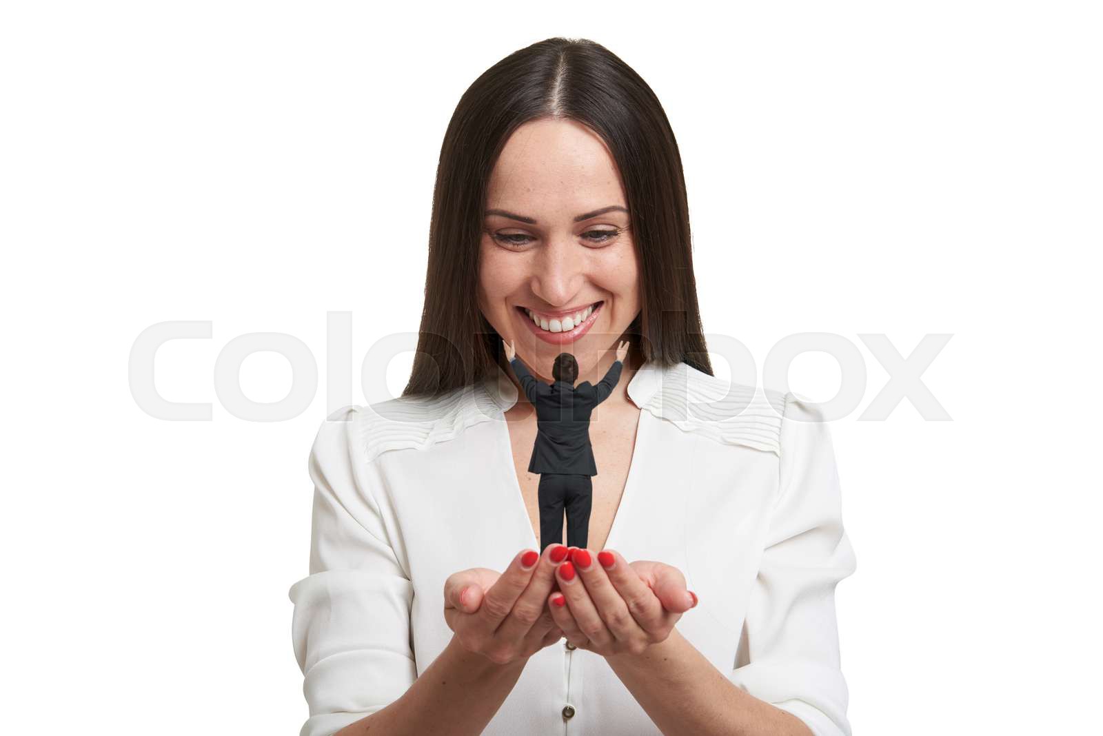 woman holding small man | Stock image | Colourbox