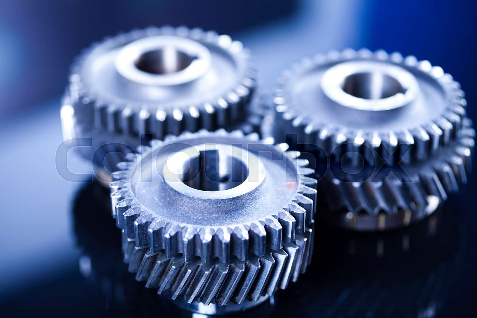 Gears meshing together, technic concept | Stock image | Colourbox