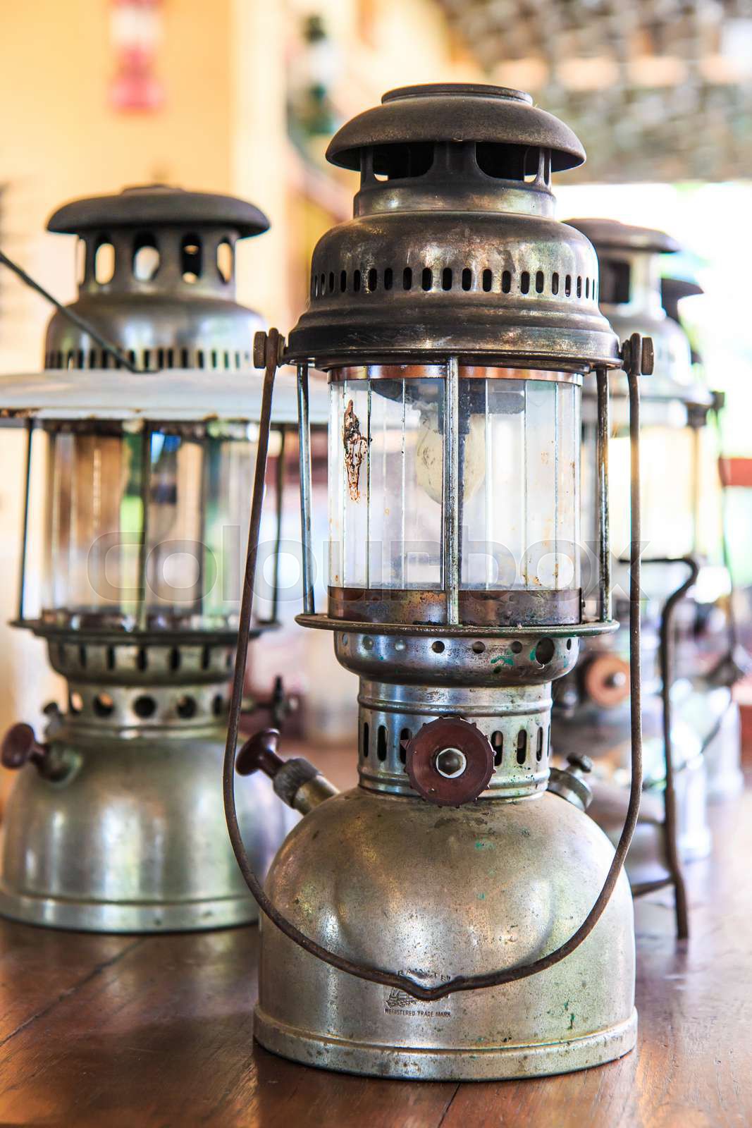 Lit hurricane lamps and lanterns or hurricane lamps | Stock image ...