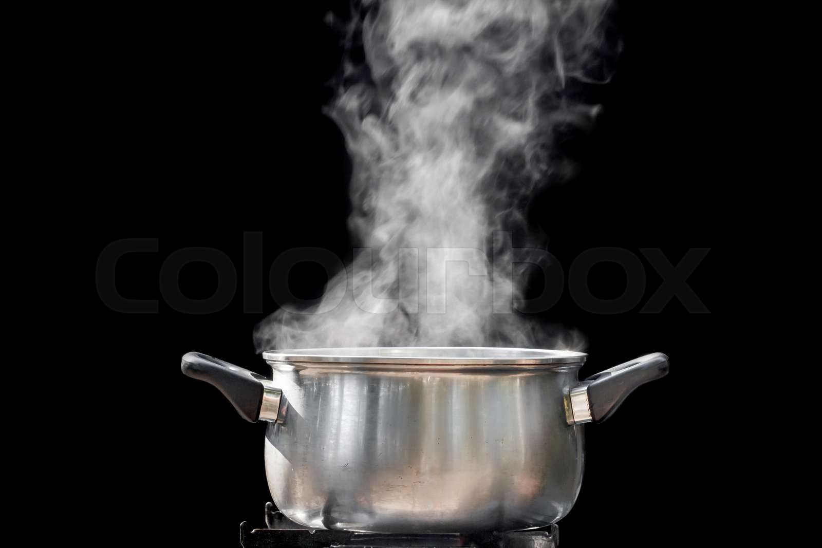 steam over cooking pot | Stock image | Colourbox