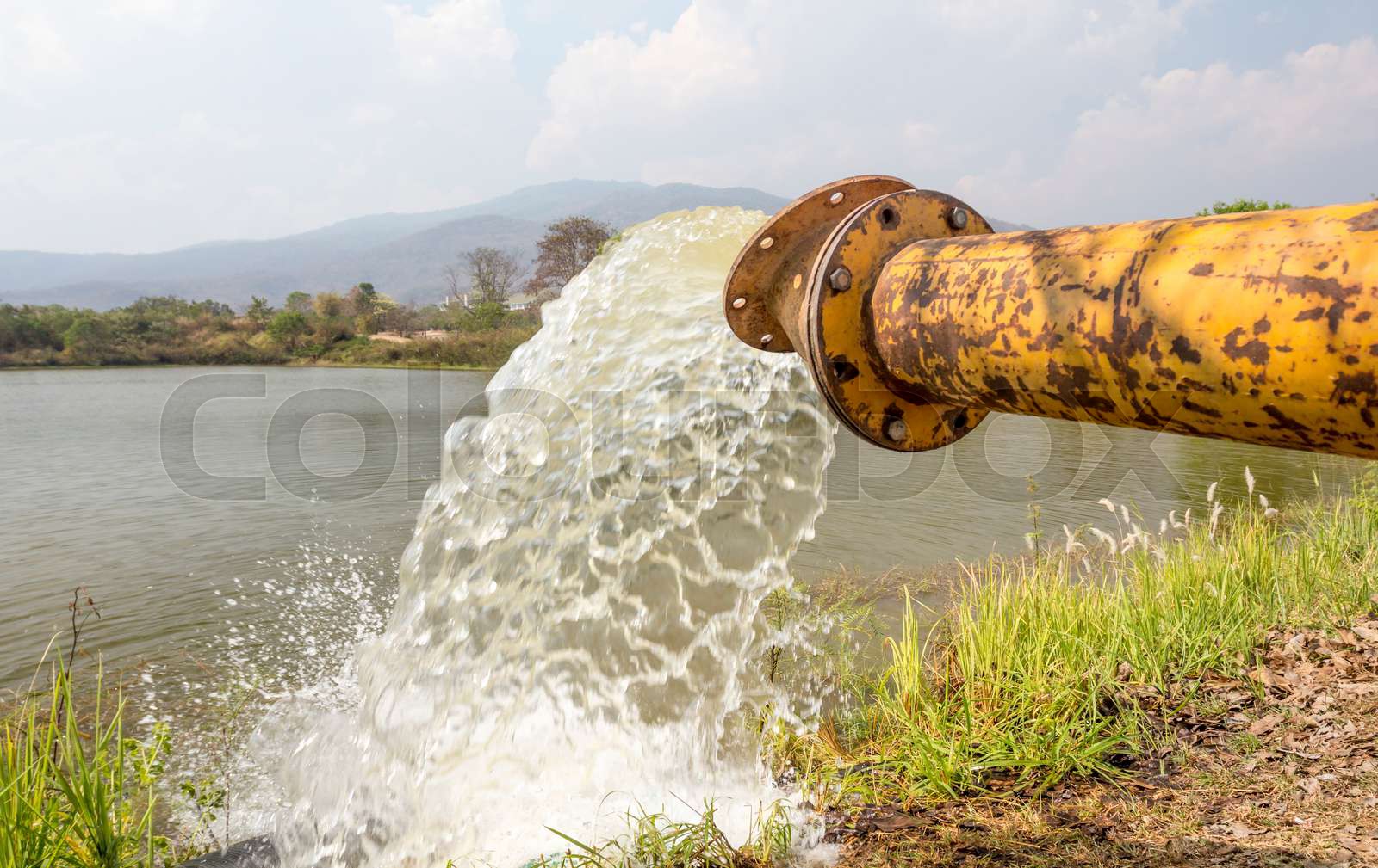Pump water fill in reservoir , storage before drought in summer | Stock ...