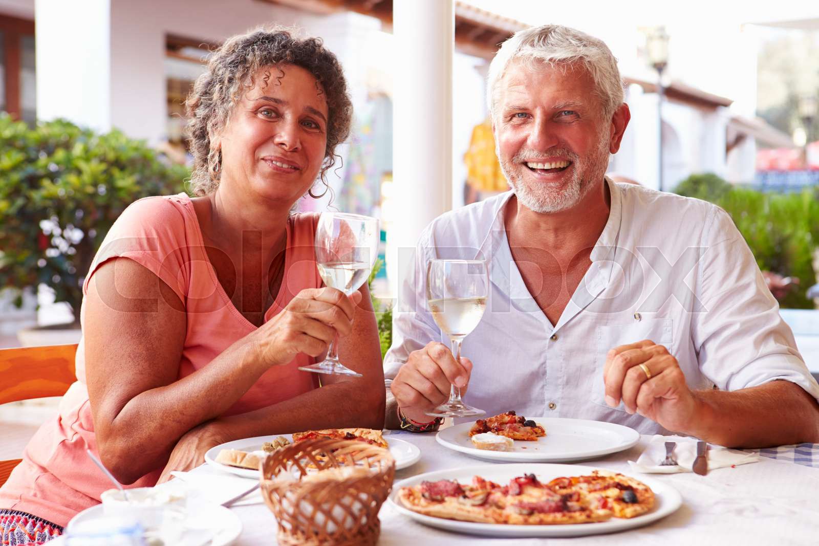 Mature Couple Eating Meal Outdoors Together | Stock image | Colourbox