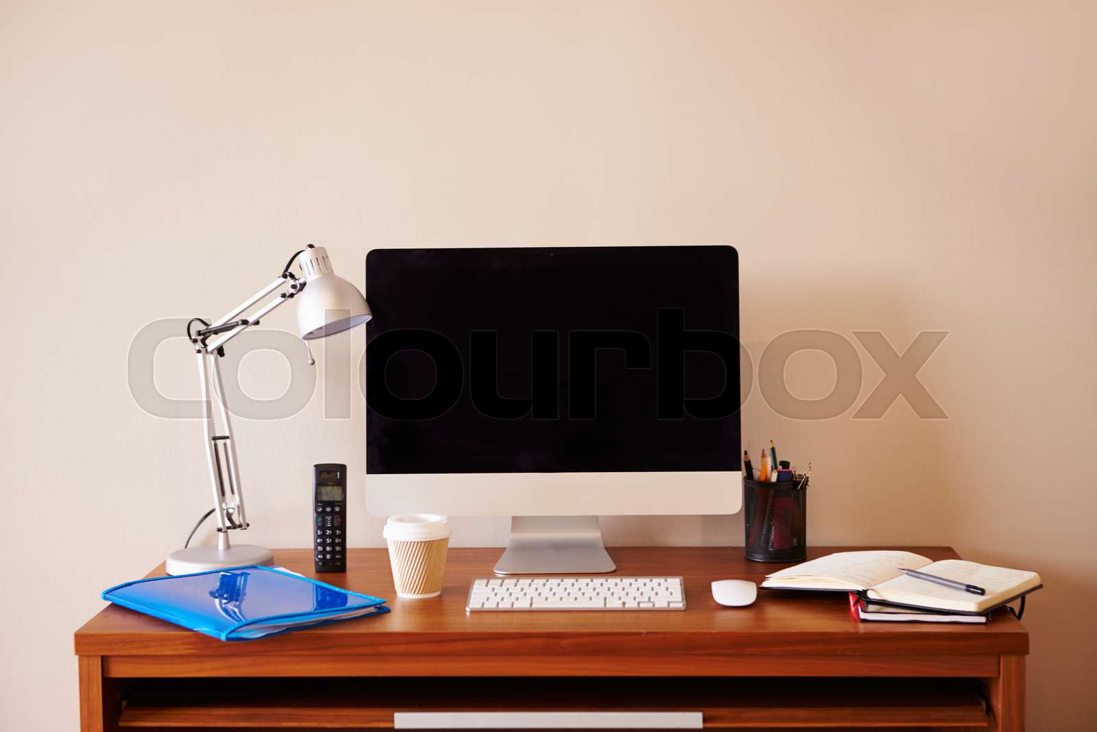 Computer On Desk In Home Office | Stock image | Colourbox