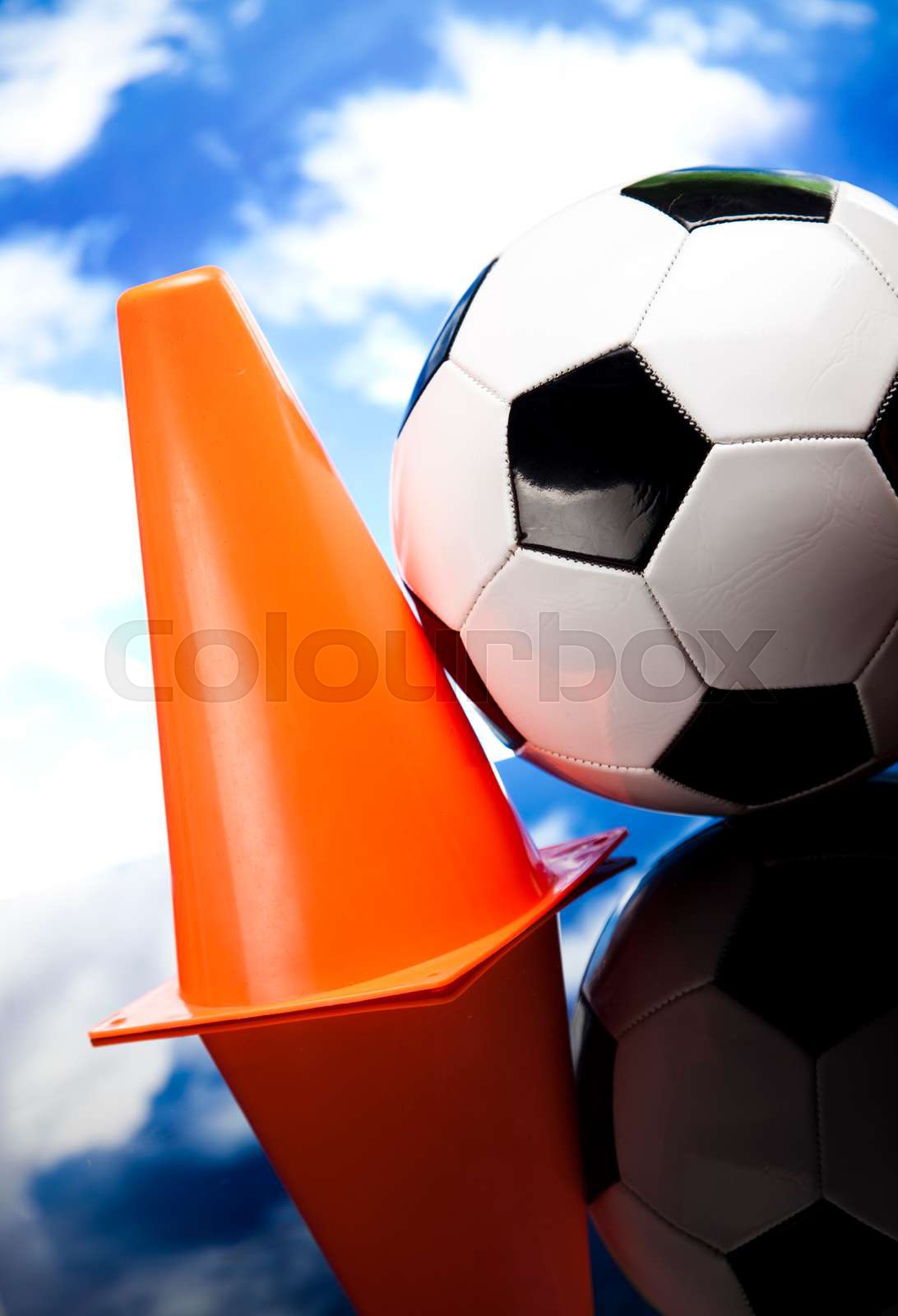 Soccer ball and sunshine, vivid colorful theme | Stock image | Colourbox