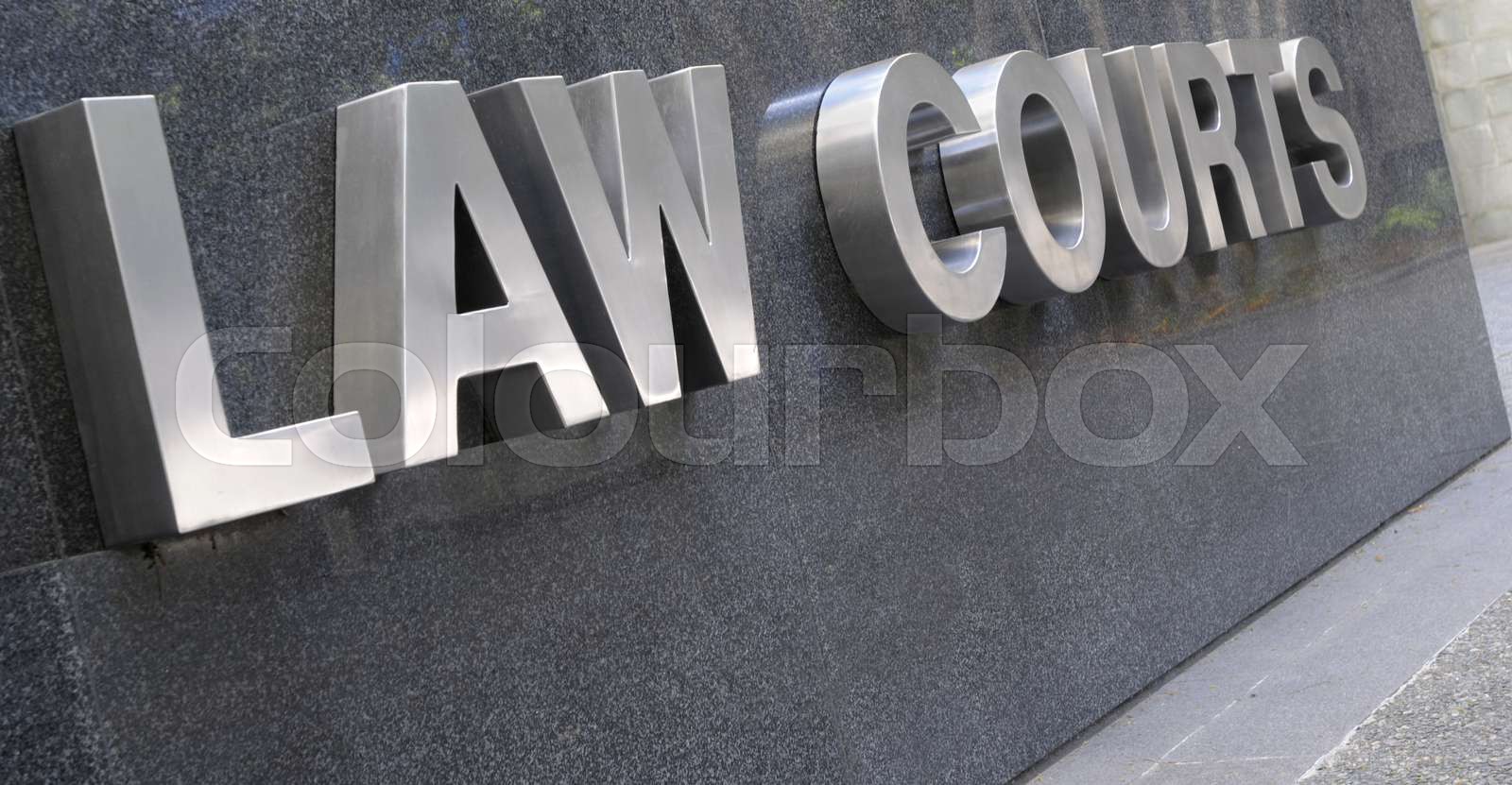Law Courts sign in stainless steel | Stock image | Colourbox
