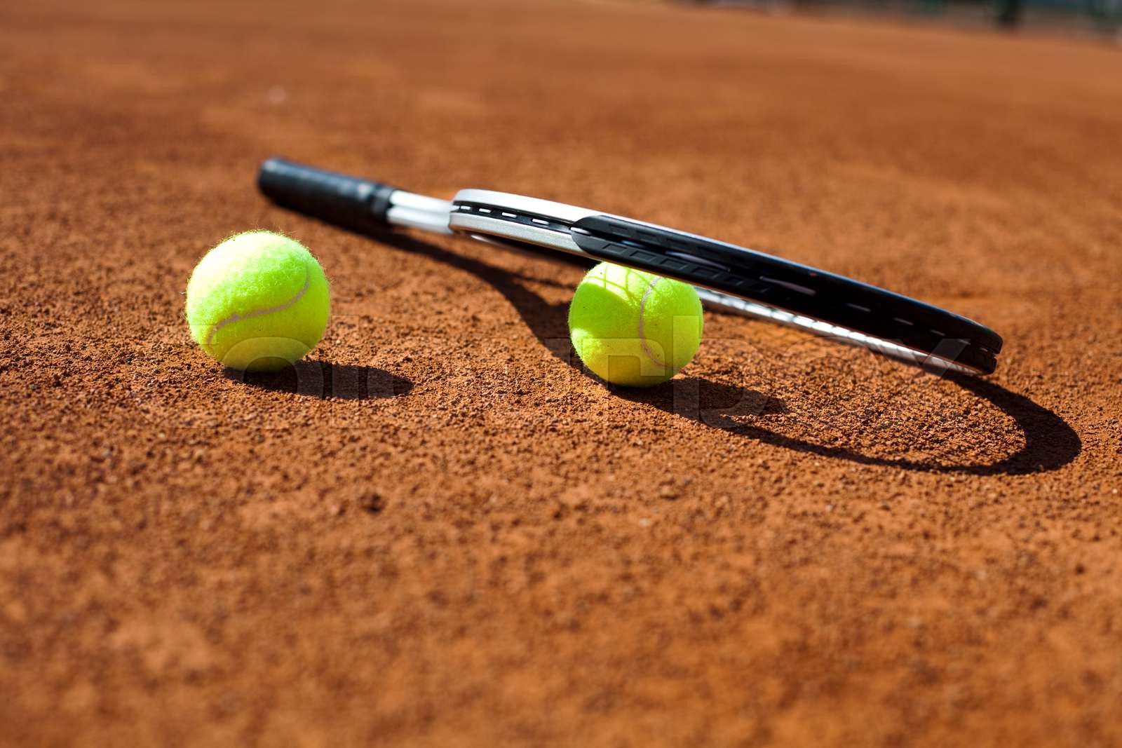 Tennis racket and balls, court | Stock image | Colourbox