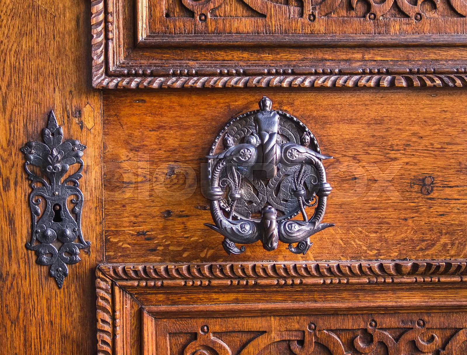 Medieval antique door-handle and key hole | Stock image | Colourbox
