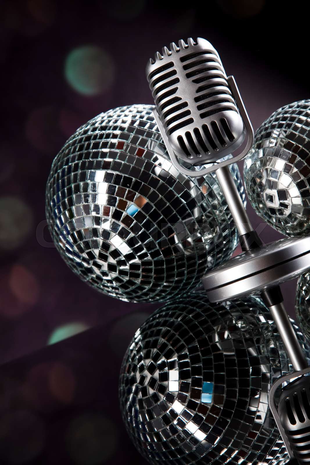 Microphone, vinyl record and Disco Balls, music saturated concept ...