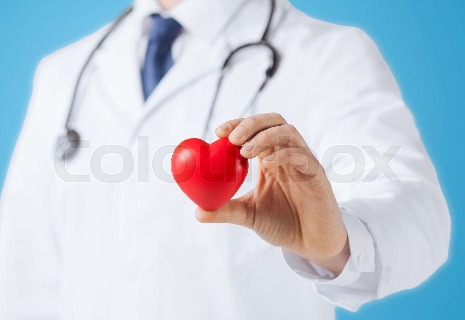 male doctor with heart | Stock image | Colourbox