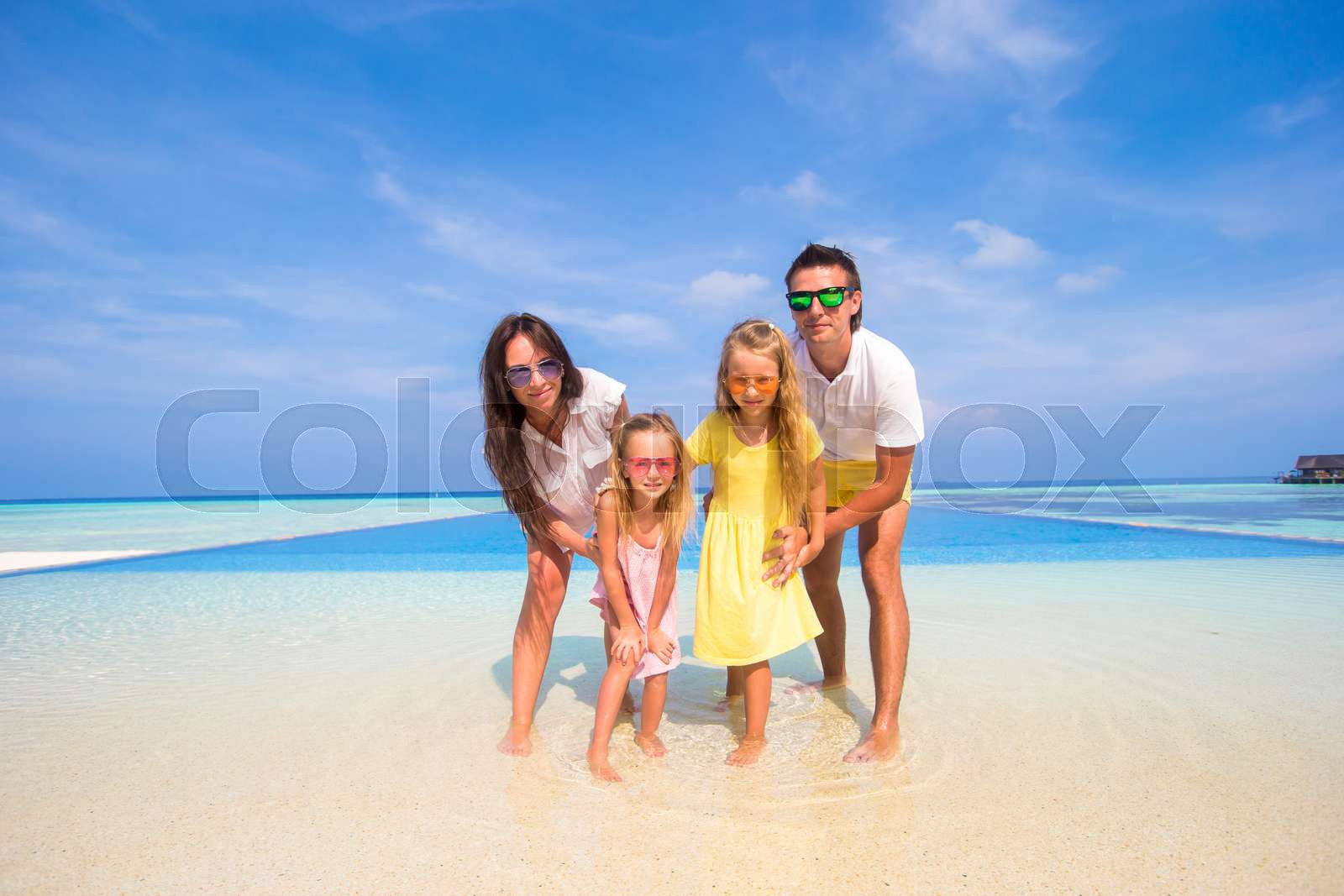 Portrait of beautiful family during summer tropical vacation | Stock ...