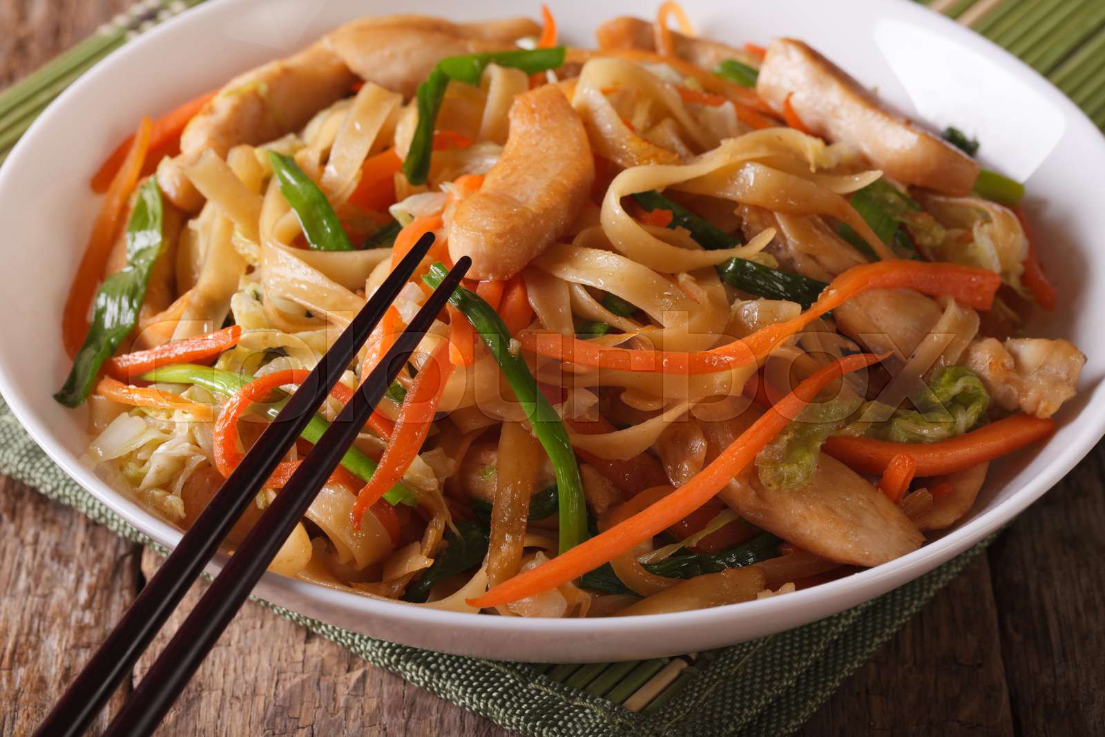 Chinese Food: Chow mein with chicken and vegetables close-up. | Stock ...