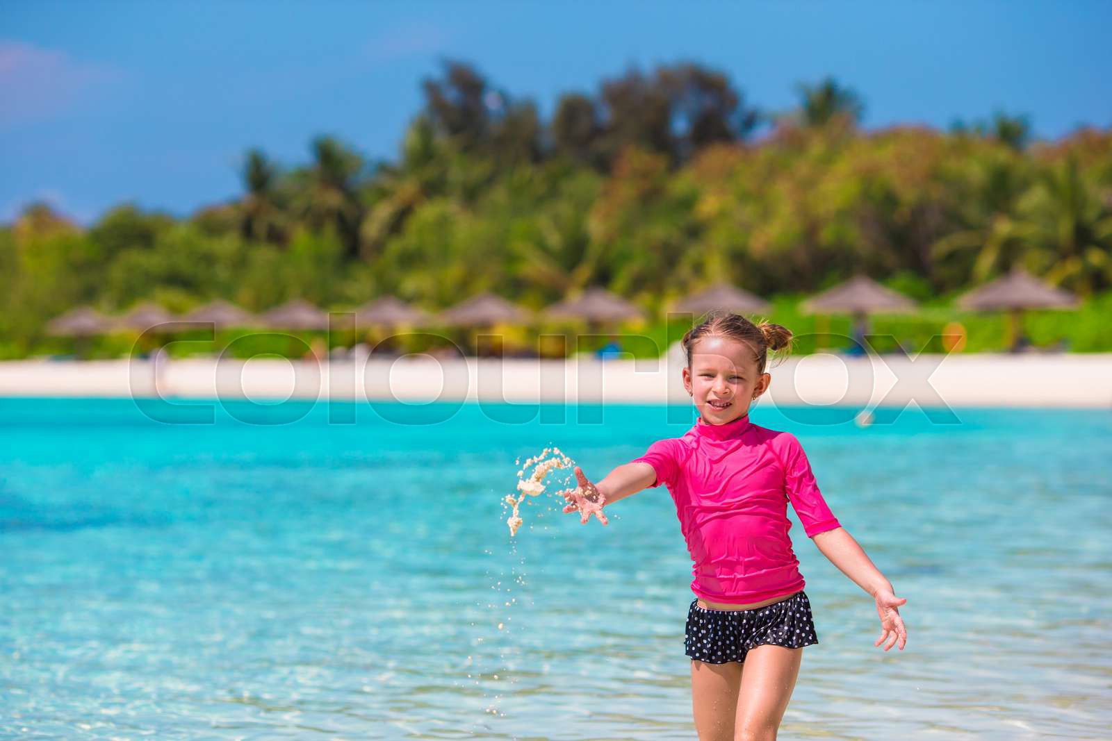 Adorable little girl at beach during summer vacation | Stock image ...