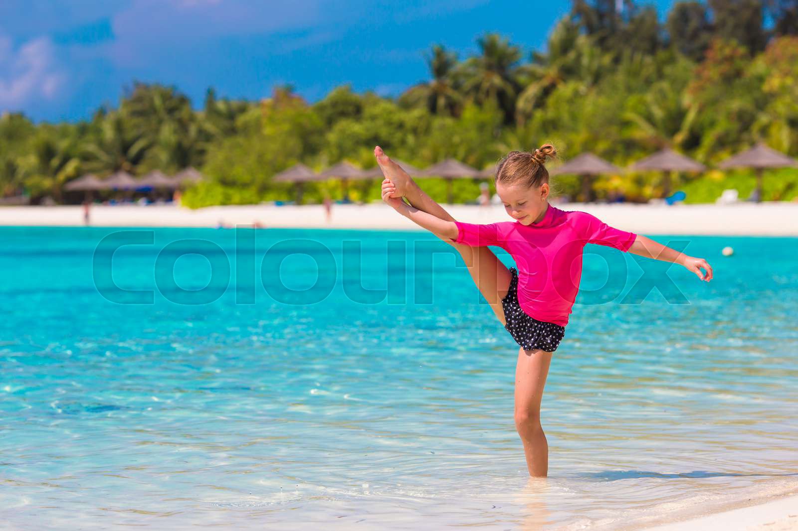 Adorable little girl at beach during summer vacation | Stock image ...