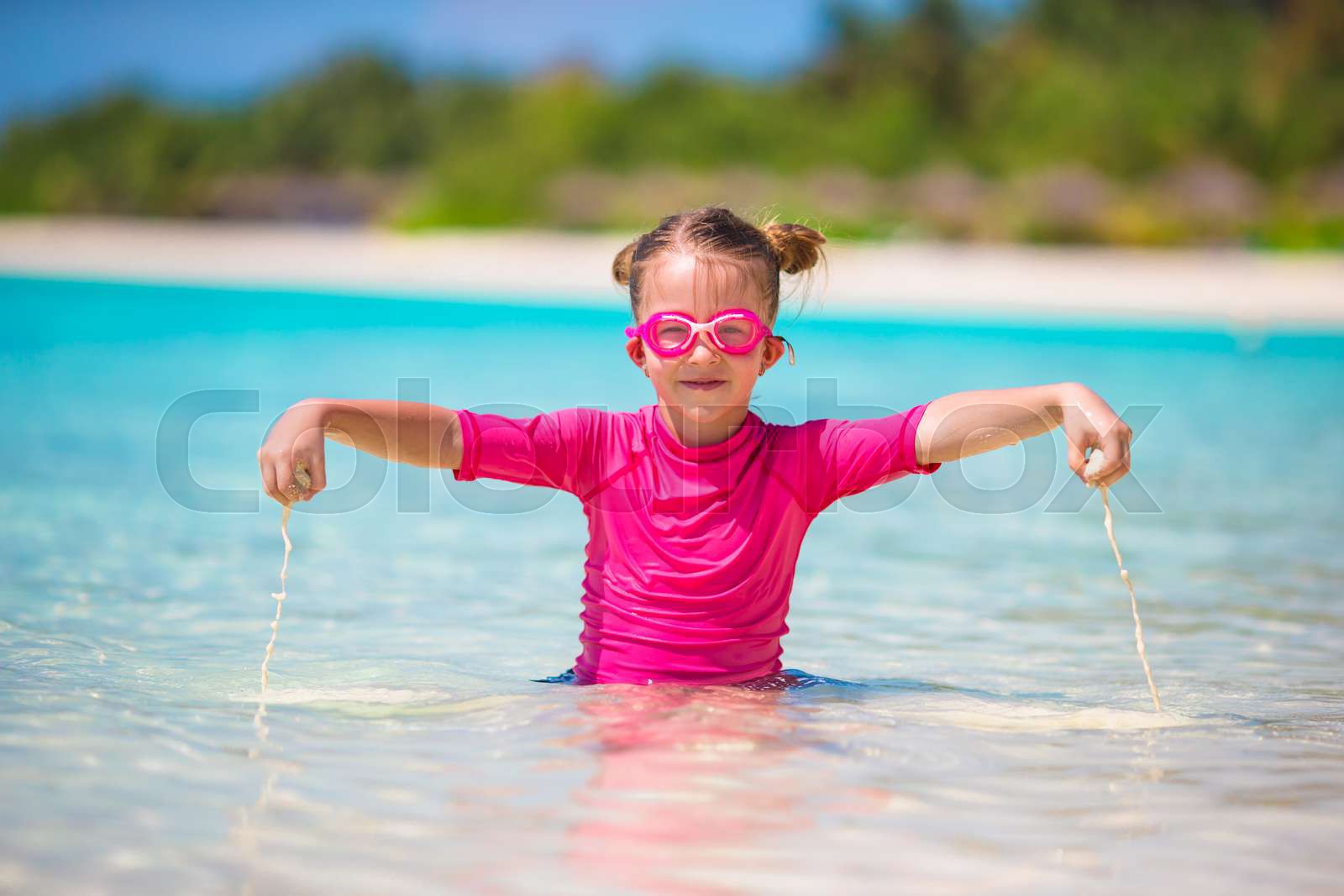 Adorable little girl at beach during summer vacation | Stock image ...