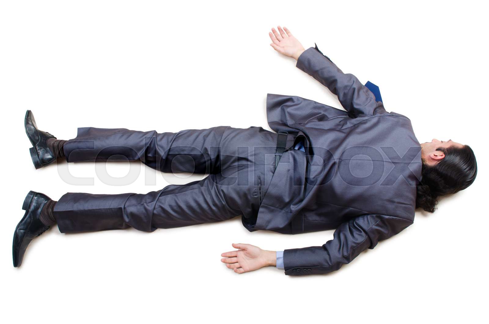 Businessman on the floor isolated on white | Stock image | Colourbox