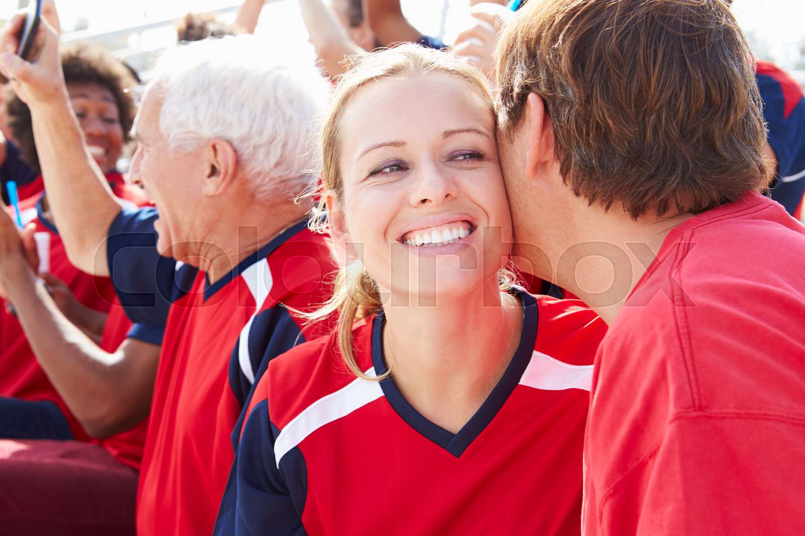 Sports Spectators In Team Colors Celebrating | Stock image | Colourbox