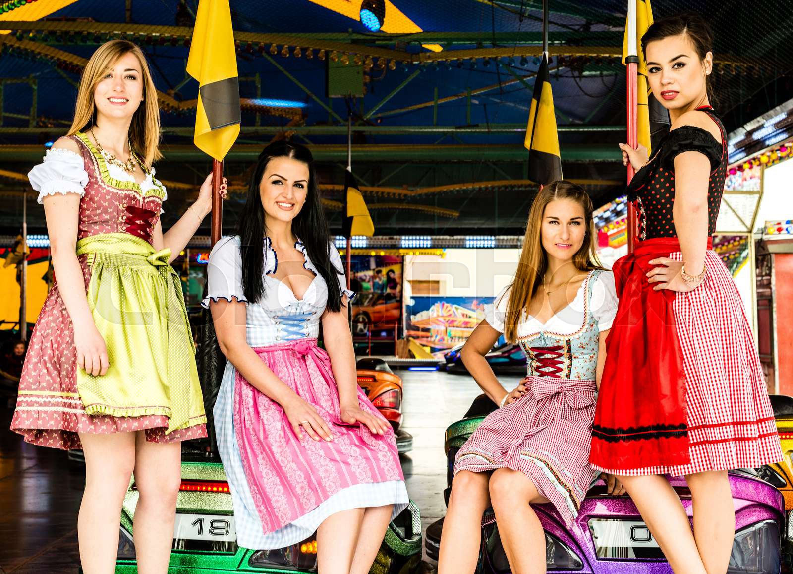 Gorgeous young women at German funfair | Stock image | Colourbox