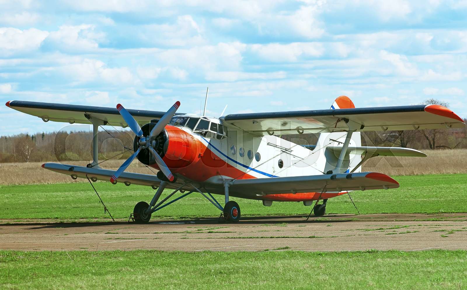 Old biplane aircraft in the airport. | Stock image | Colourbox