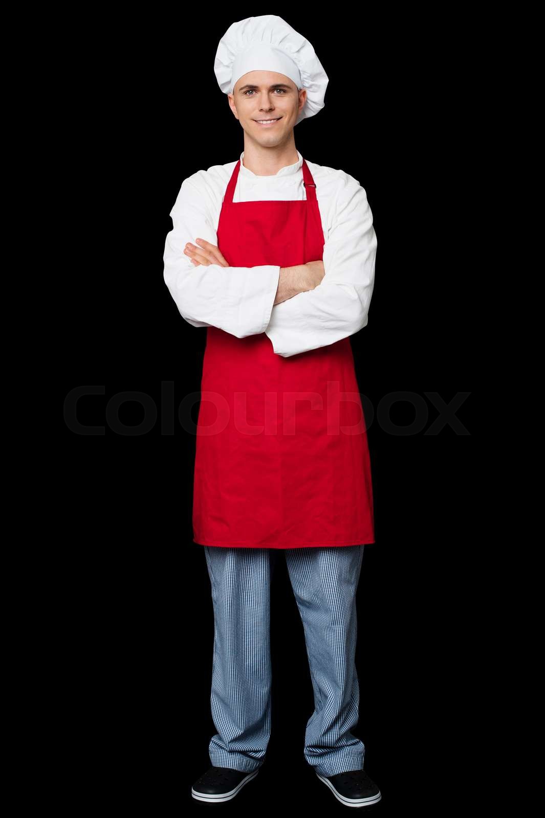 Handsome chef posing with arms crossed | Stock image | Colourbox